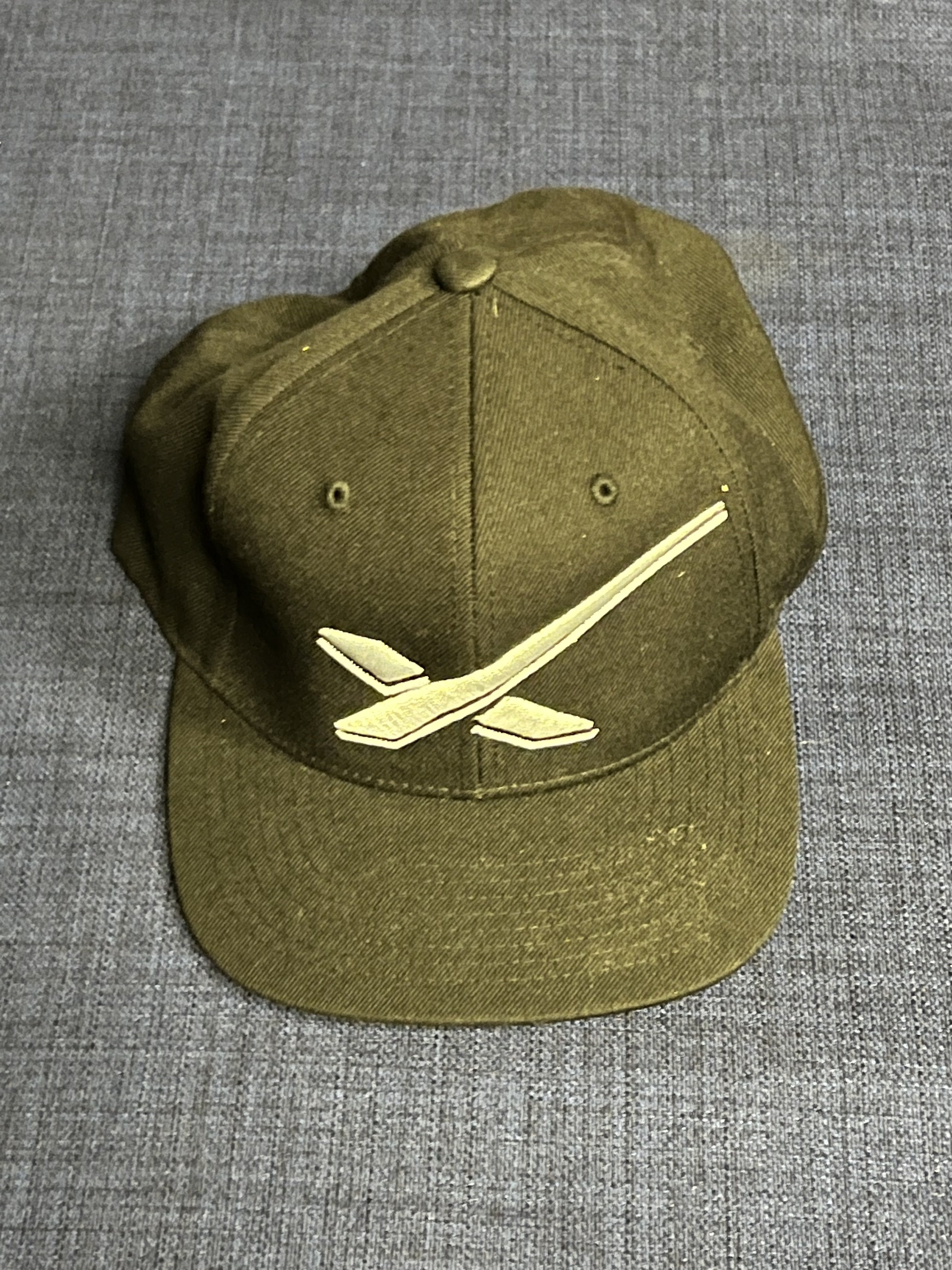 BONES: Lance Sweets' Black SPACE X Hat – HOLLYWOOD PICTURES STUDIOS, LLC.